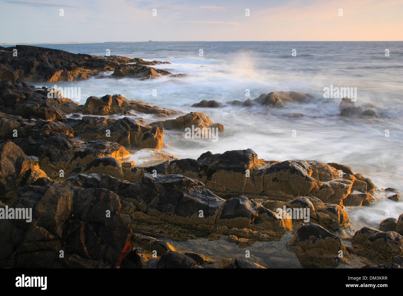 View Bamburgh surf England rock cliff Great Britain Europe Holy Island ...