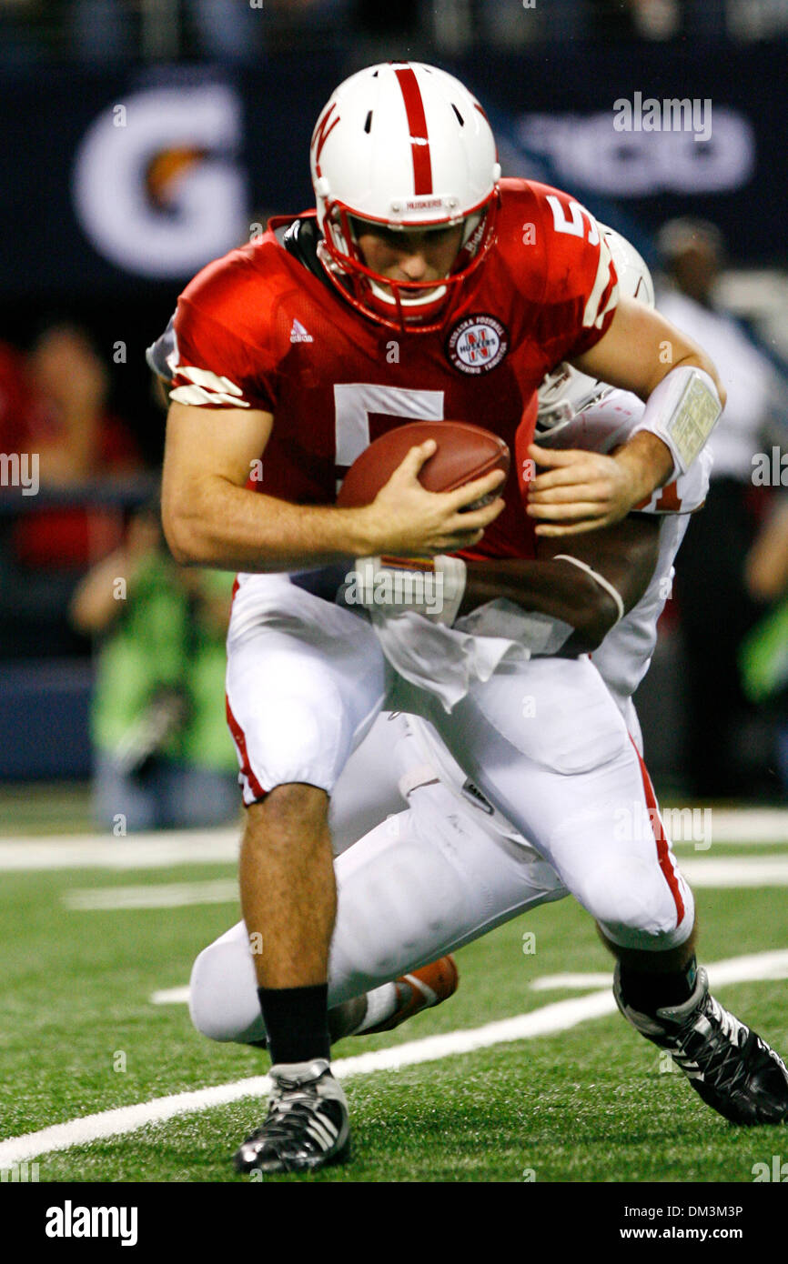 Nebraska quarterback is sacked for a loss by Texas linebacker Sergio ...
