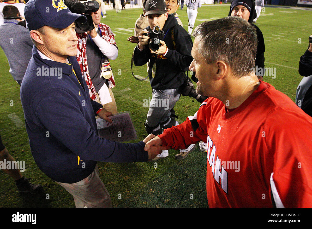 Utah Utes coach Kyle Whittingham greets Cal Bears coach Jeff Tedford ...