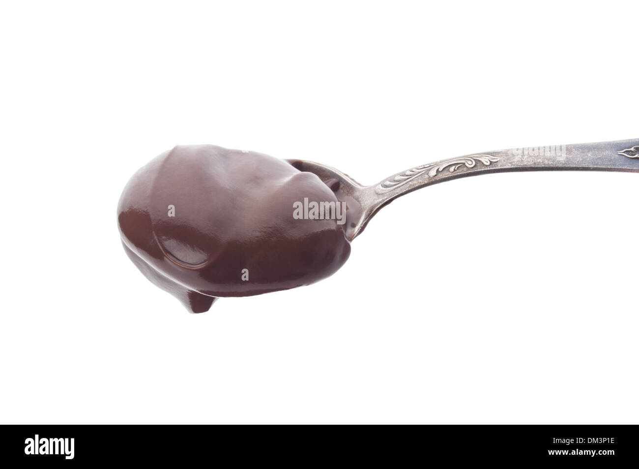Spoon with chocolate pudding close up on white background Stock Photo ...