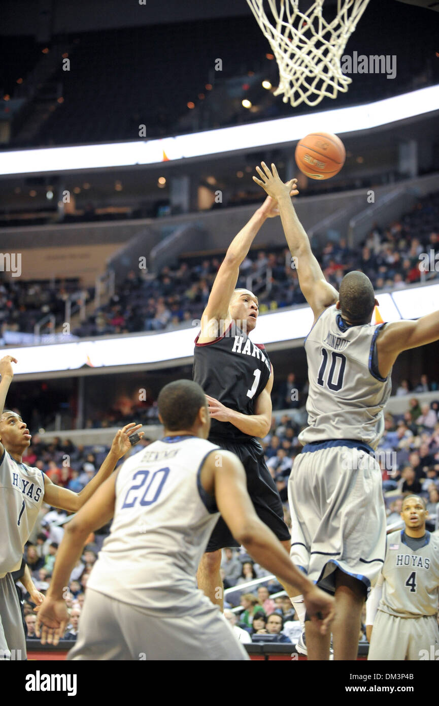 Washington DC. .Harvard guard Christian Webster (1) and Georgetown ...