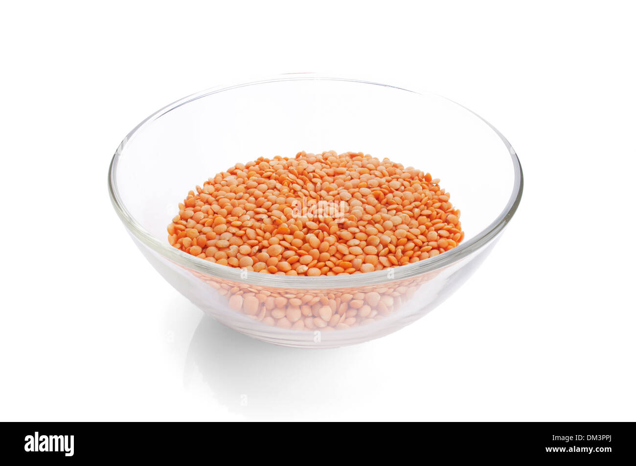 Bowl of red lentils isolated on white background Stock Photo - Alamy