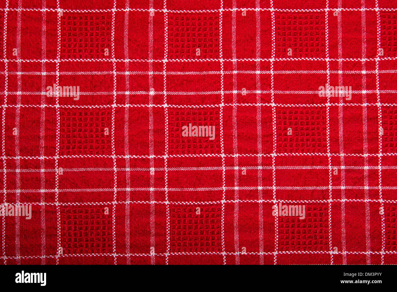 Material into a red grid, a textile background Stock Photo - Alamy