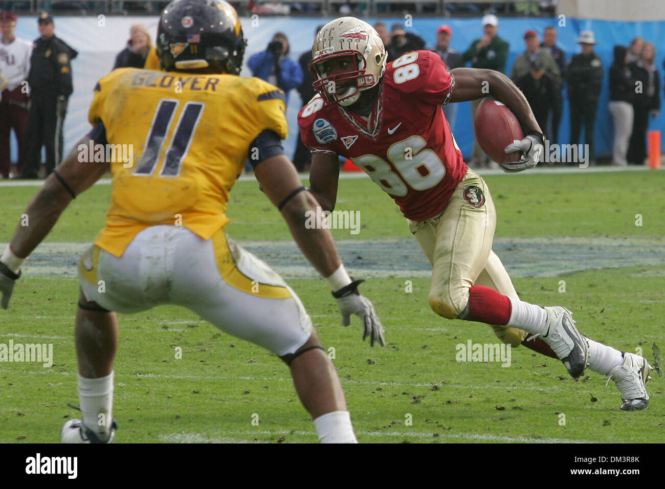Rod Owen looks to get past Sidney Glover in the game between West ...