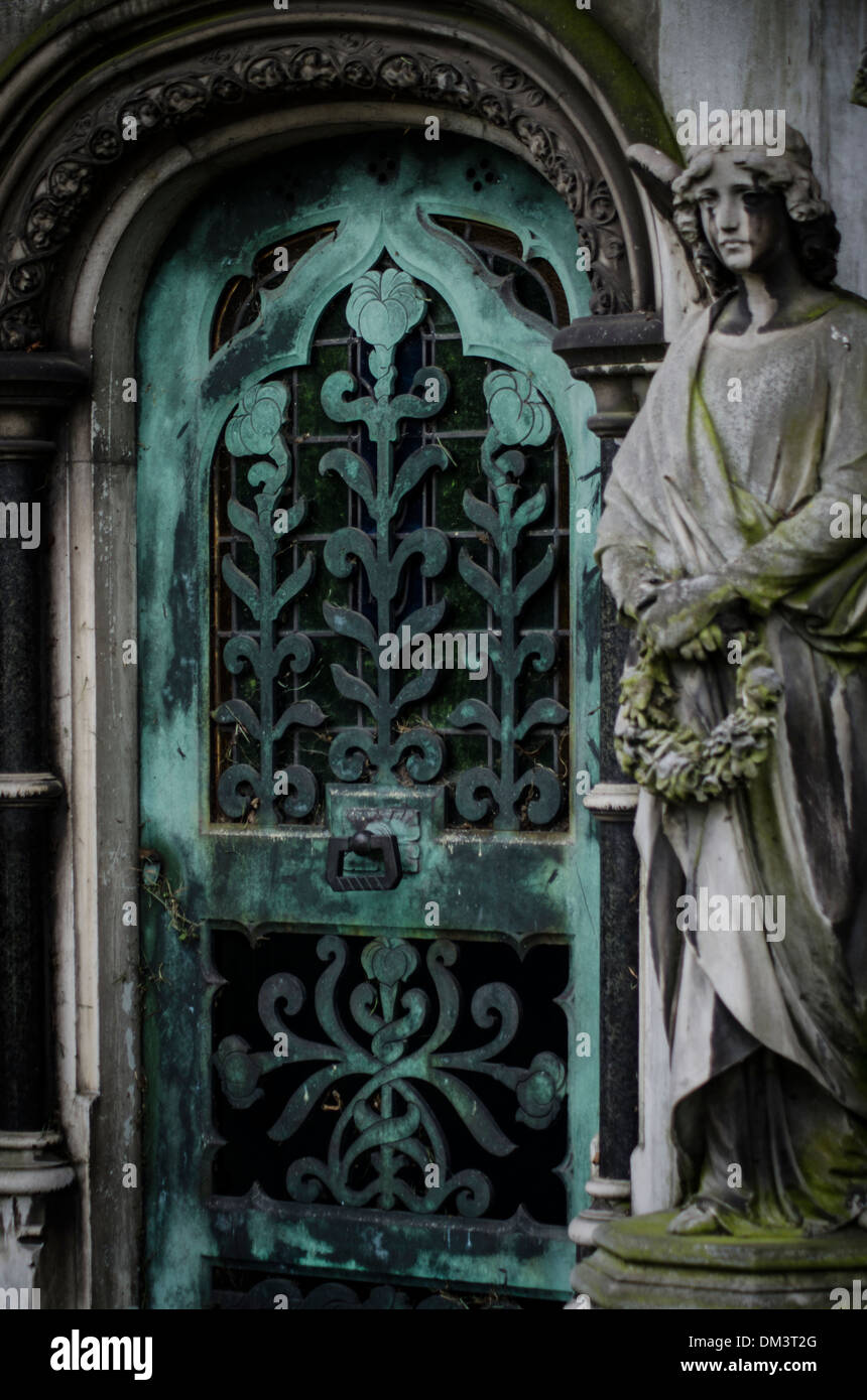 Ornate Mausoleum Door with Guardian Angel Stock Photo - Alamy