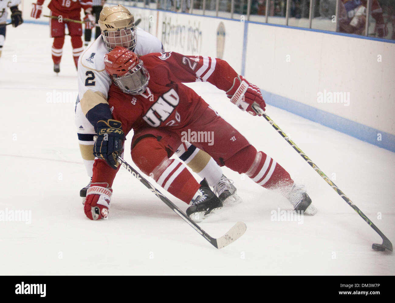 Notre Dame Defenseman Kyle Lawson (2) and Nebraska-Omaha Center Alex ...