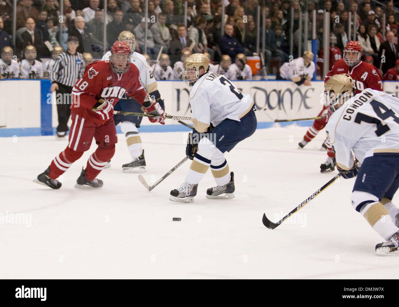Notre Dame Defenseman Kyle Lawson (2), Nick Condon (14) and Nebraska ...