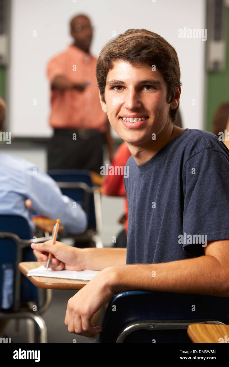 Male Teenage Pupil In Classroom Stock Photo - Alamy