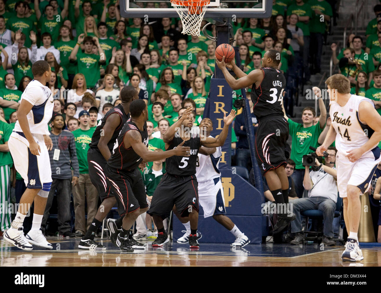 Forward Yancy Gates (34) grabs rebound in first half game action ...