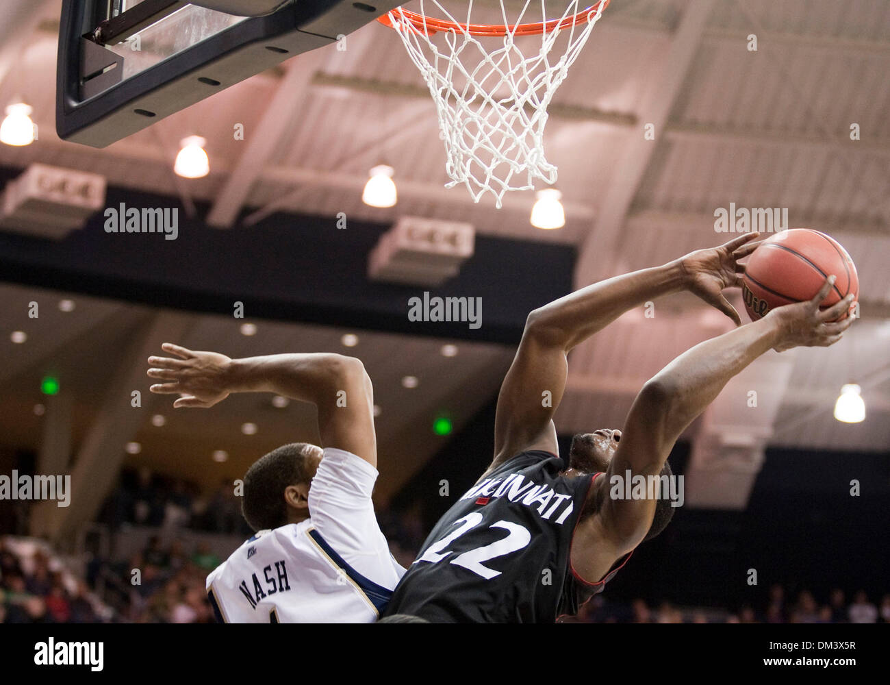 Cincinnati Forward Rashad Bishop (22) and Notre Dame Forward Tyrone ...