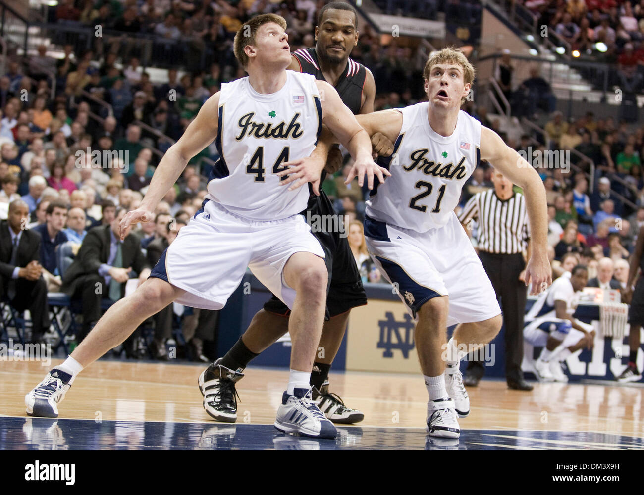 Notre Dame Forwards Luke Harangody (44) and Tim Abromaitis (21) block ...
