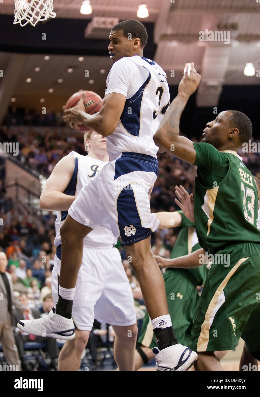 Notre Dame Forward Carleton Scott (34) grabs rebound in game action ...