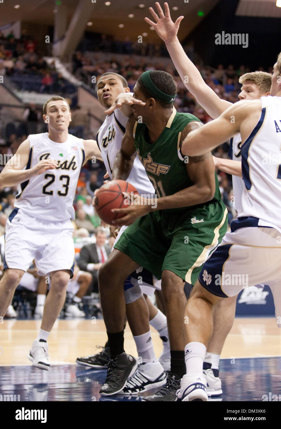 Notre Dame Forward Tyrone Nash (1) defends South Florida Forward Jarrid ...