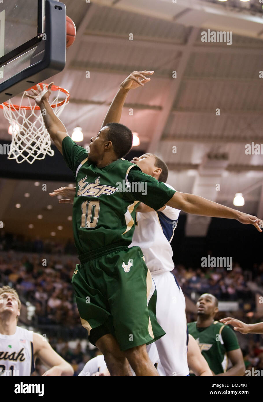 South Florida Guard Anthony Crater (10) goes for layup against Notre ...