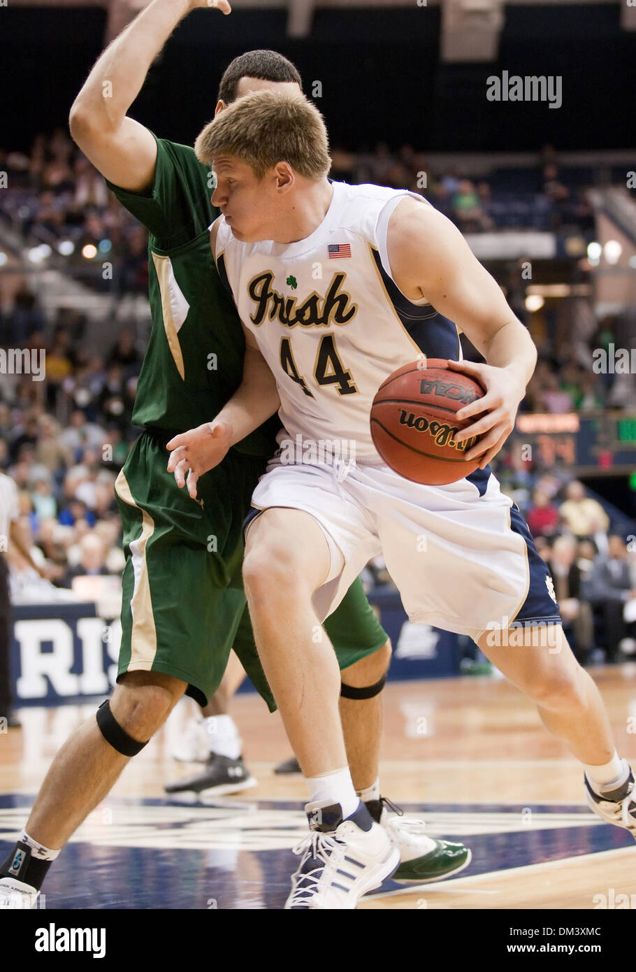 Notre Dame Forward Luke Harangody (44) in game action between the Notre ...