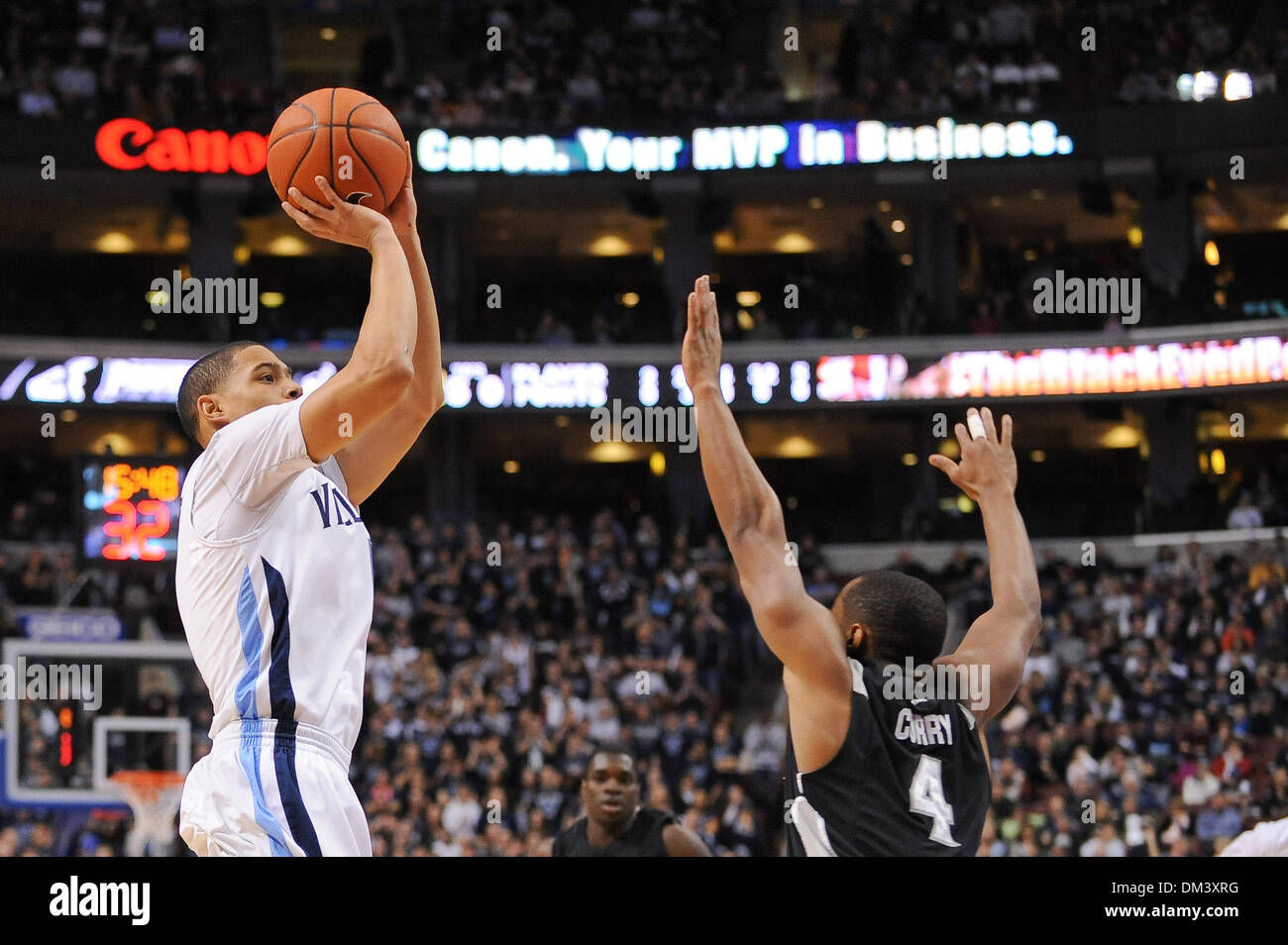 Villanova guard Corey Fisher #10 shoots a jumper in game action ...