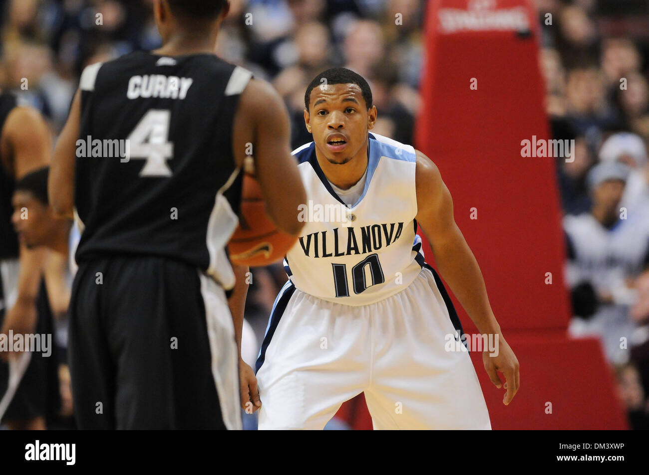 Villanova guard Corey Fisher #10 in a defensive posture while ...