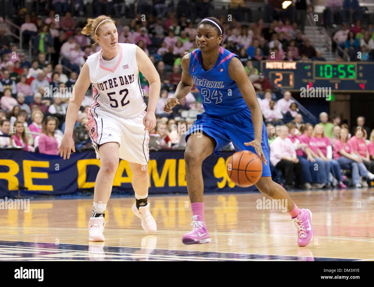 DePaul Forward Keisha Hampton (24) and Notre Dame Center Erica ...