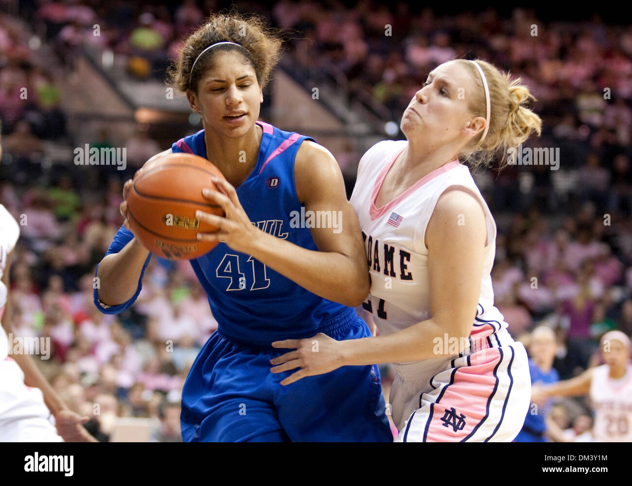 DePaul Forward Felicia Chester (41) and Notre Dame Guard Natalie ...