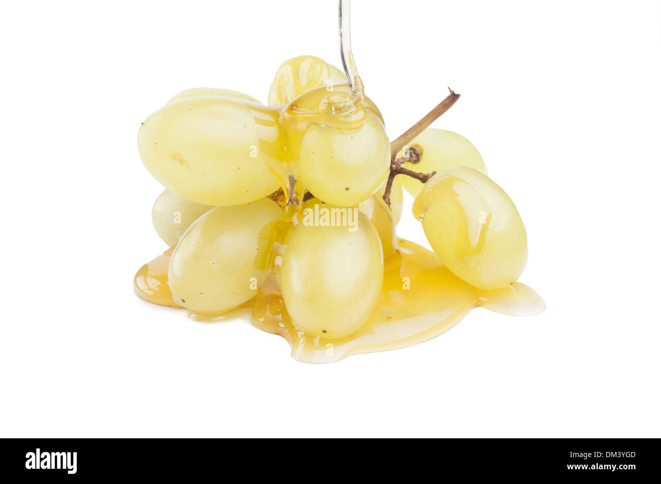green grapes and honey isolated on white Stock Photo - Alamy