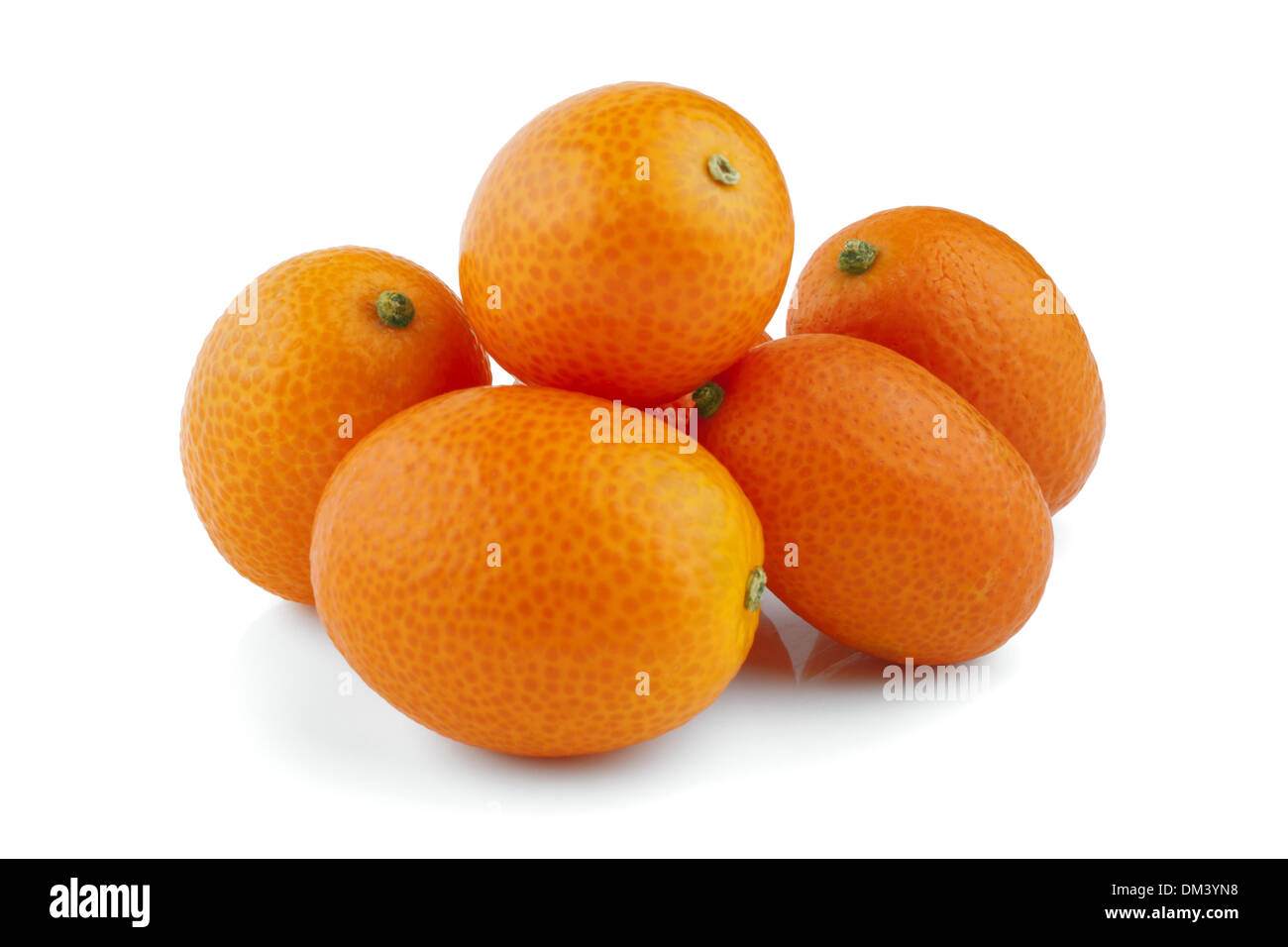 Sweet kumquat citrus fruits closeup on white Stock Photo - Alamy