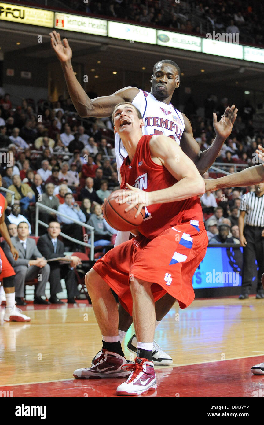 Dayton forward/center Kurt Huelsman #41 with the ball down low being ...