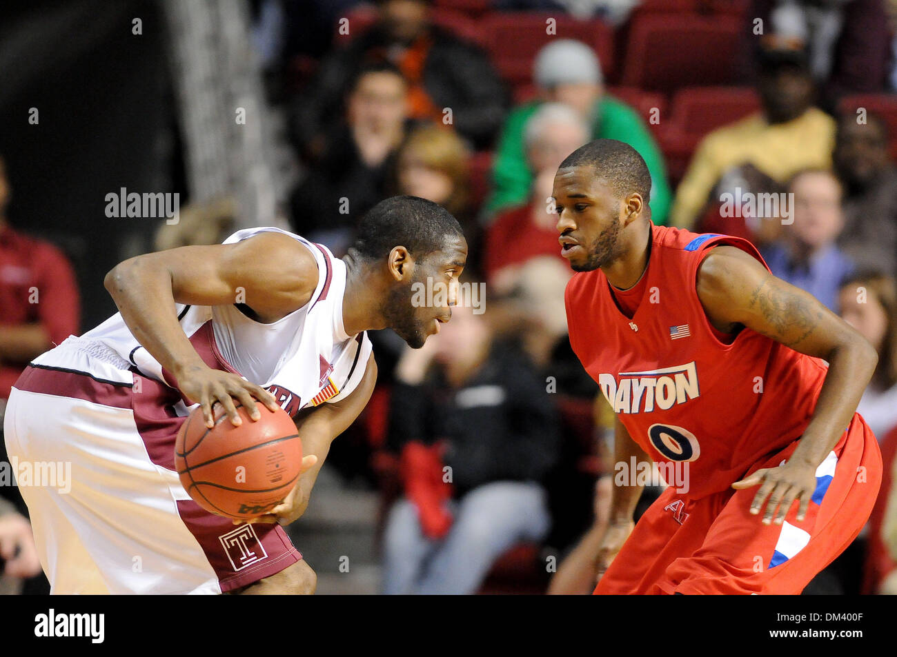 Temple guard Ryan Brooks #2 being guraded by Dayton guard Mickey Perry ...