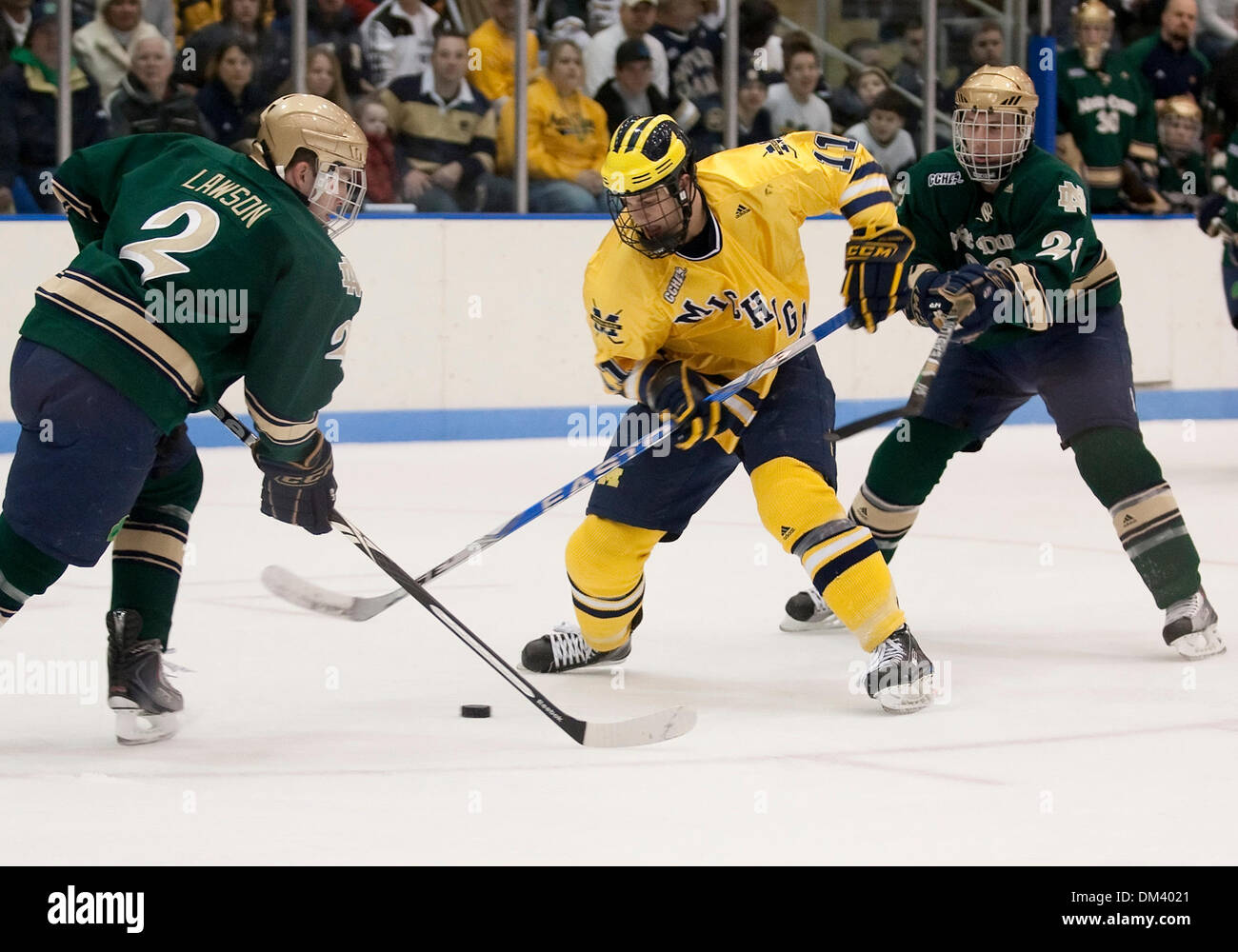 Michigan Right Wing Kevin Lynch (11) and Notre Dame Defensemen Kyle ...