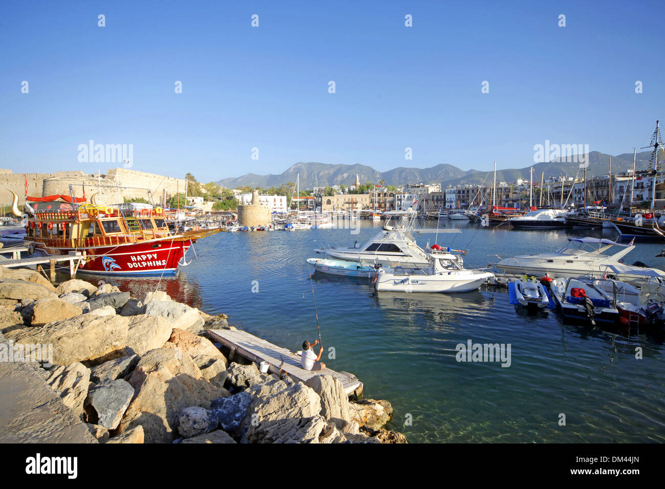 BOY FISHING & BOATS IN HARBOUR KYRENIA NORTHERN CYPRUS 25 May 2013 ...