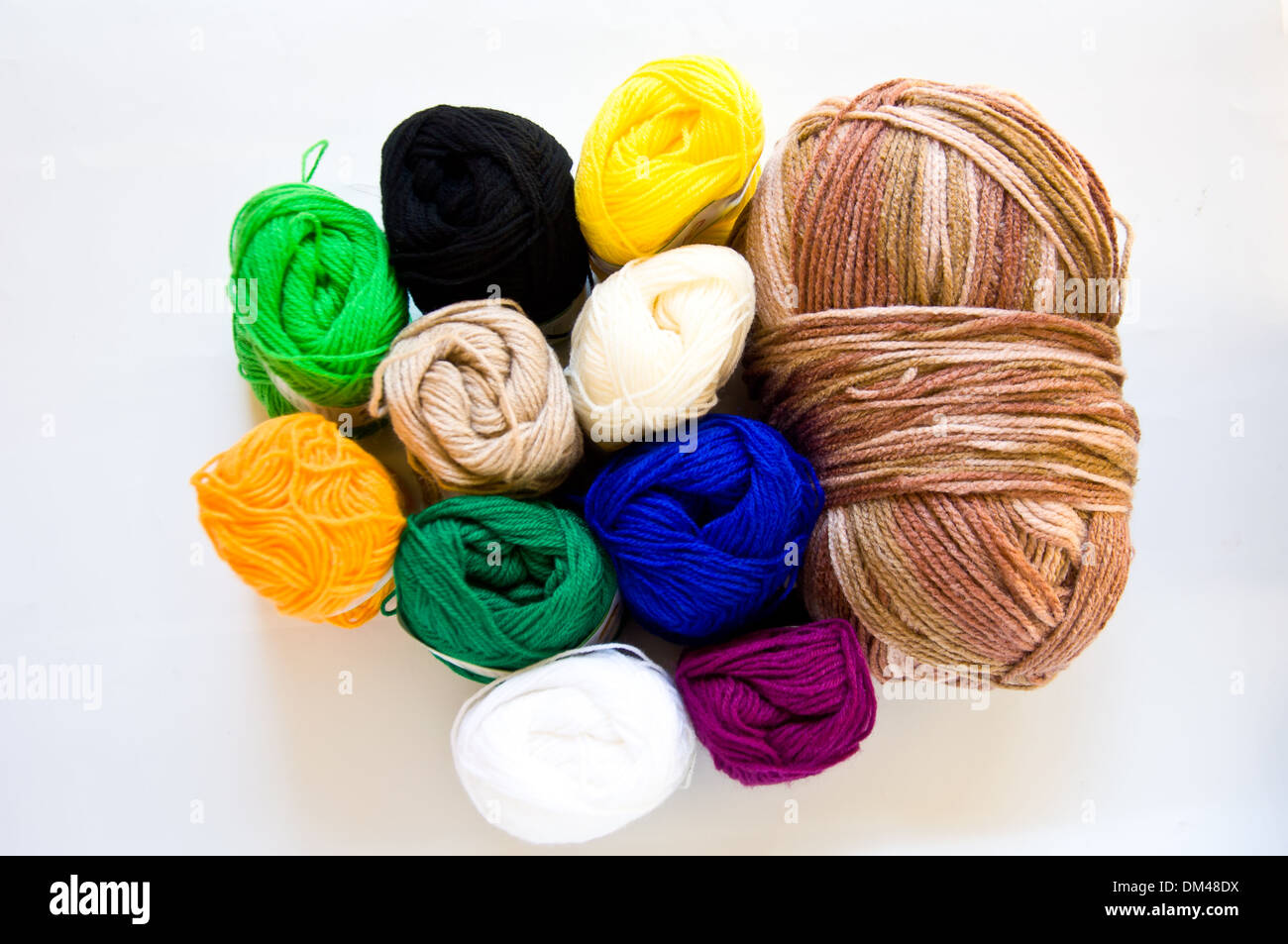 colorful of silk for knitting on white background Stock Photo - Alamy