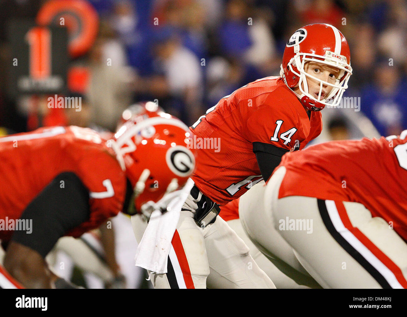 Georgia quarterback Joe Cox (14) signals to a motioning receiver at the ...
