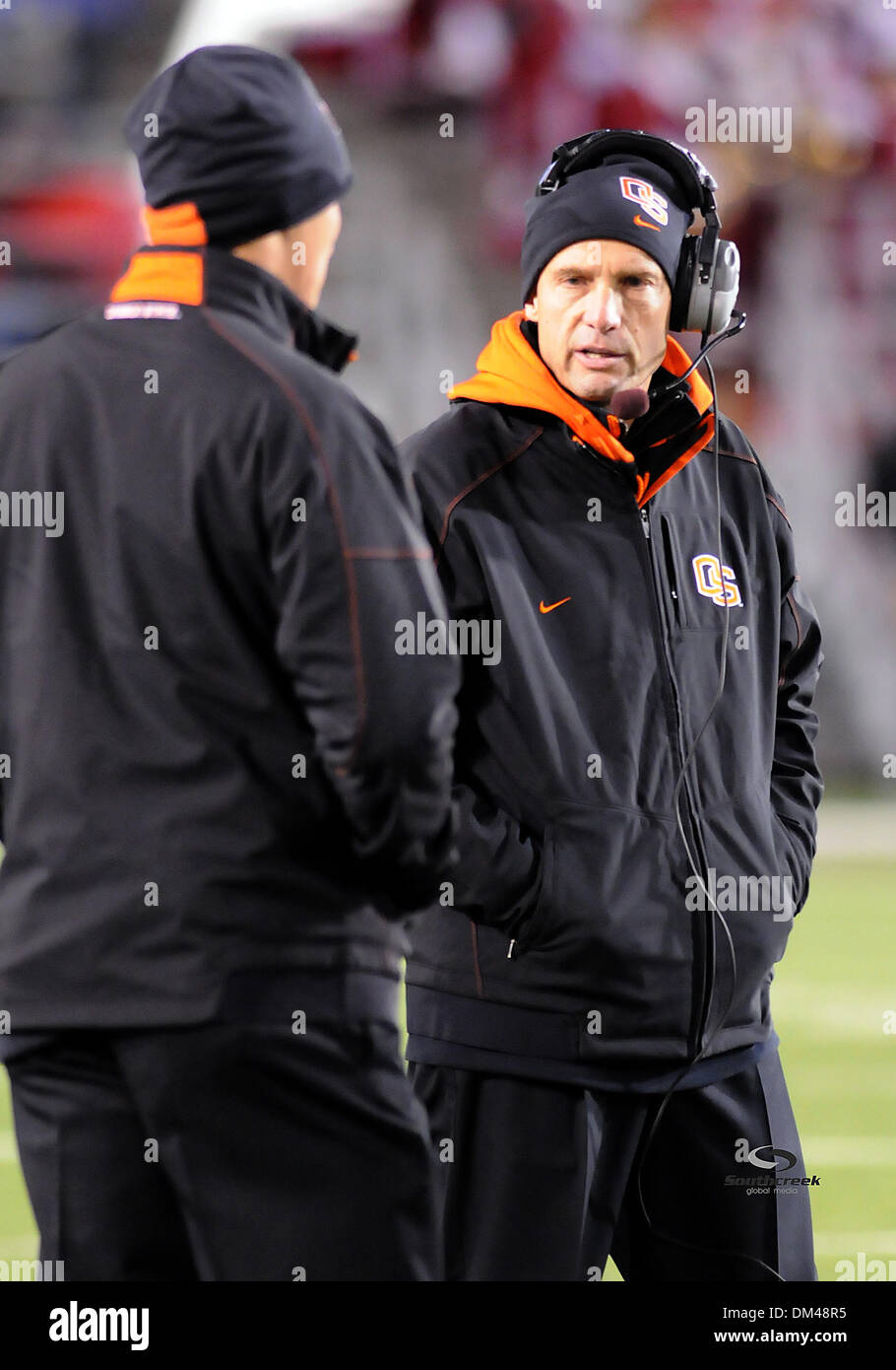 Oregon State head football coach Mike Riley looks down the sideline ...