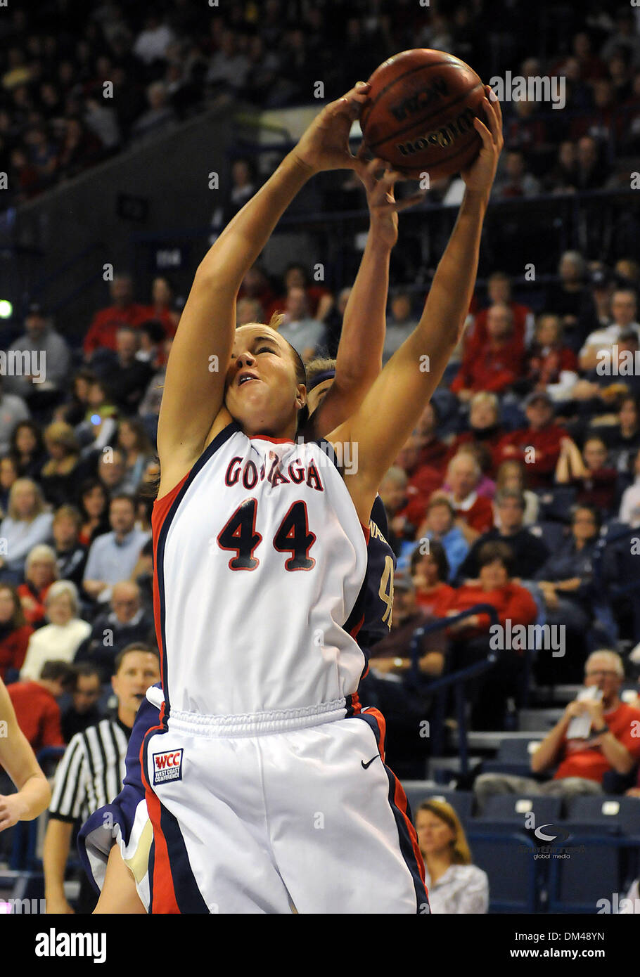 Gonzaga's Kelly Bowman (44) pulls down the rebound during the first ...