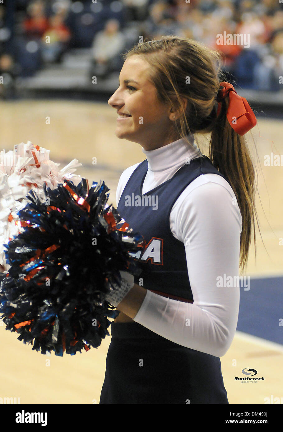 A member of the Gonzaga cheer squad tries to get the crowd fired up ...