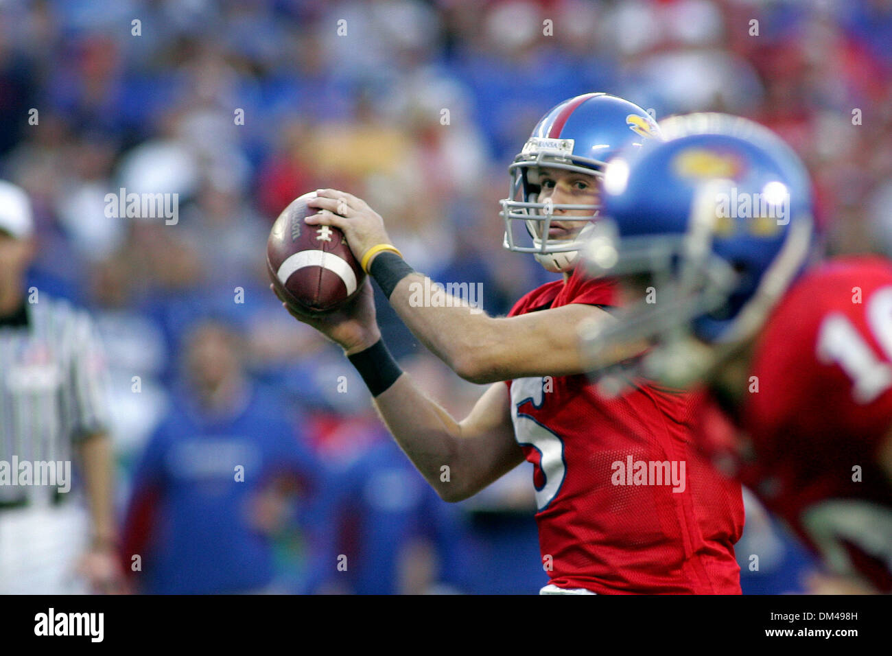Kansas quarterback Todd Reesing (5) takes the snap during game action ...