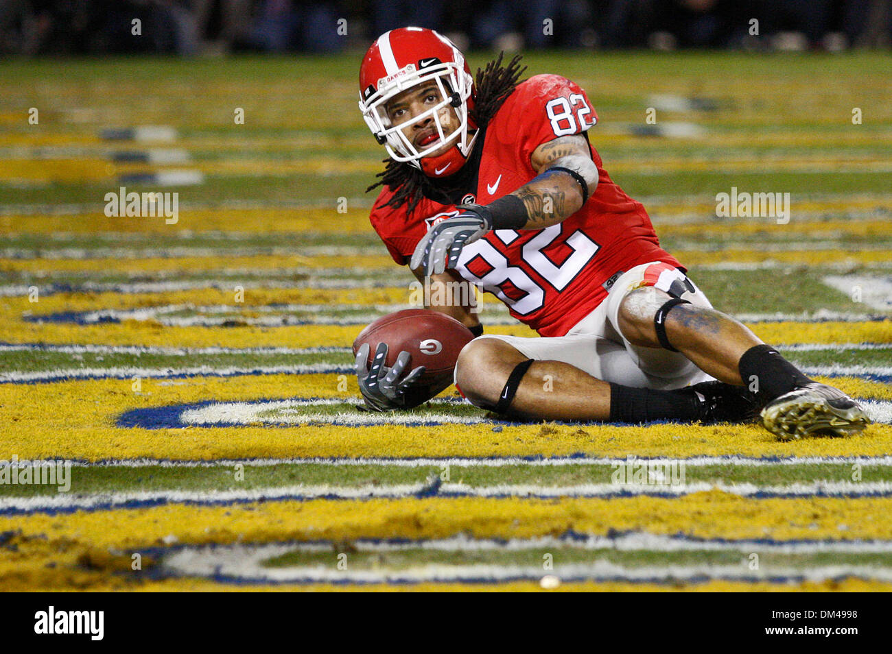 Georgia wide receiver Michael Moore (82) looks up after catching a ...