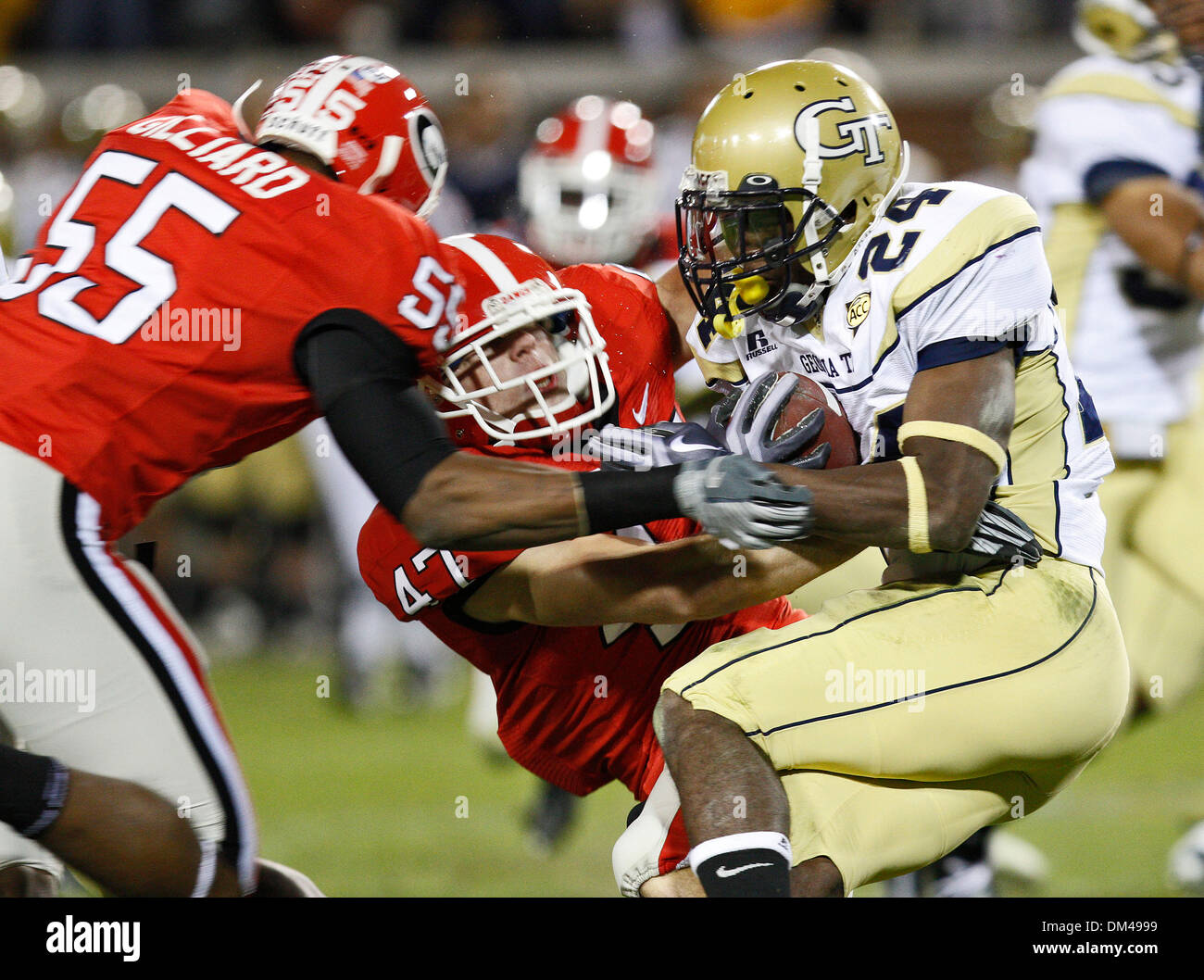 Georgia Tech running back Embry Peeples (24) is tackled by Georgia ...