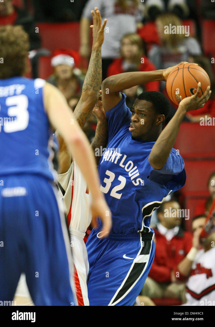 Saint Louis forward Cory Remekun (32) looks for a pass at the game ...