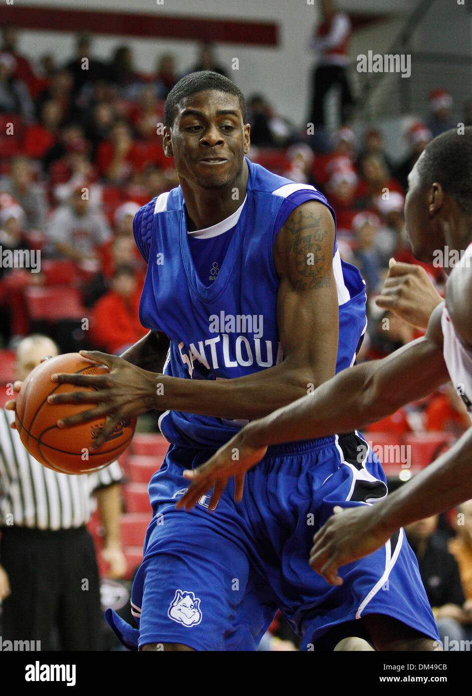 Saint Louis forward Willie Reed (33) grabs a rebound at the game ...
