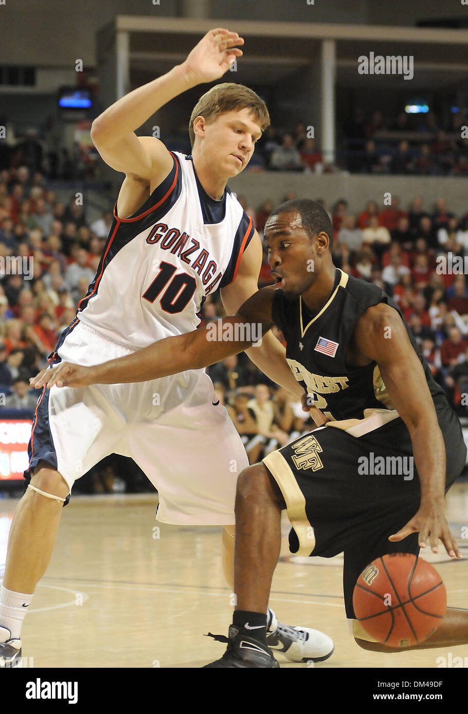 Wake Forest's Gary Clark, right, tries to get by Gonzaga's Grant Gibbs ...