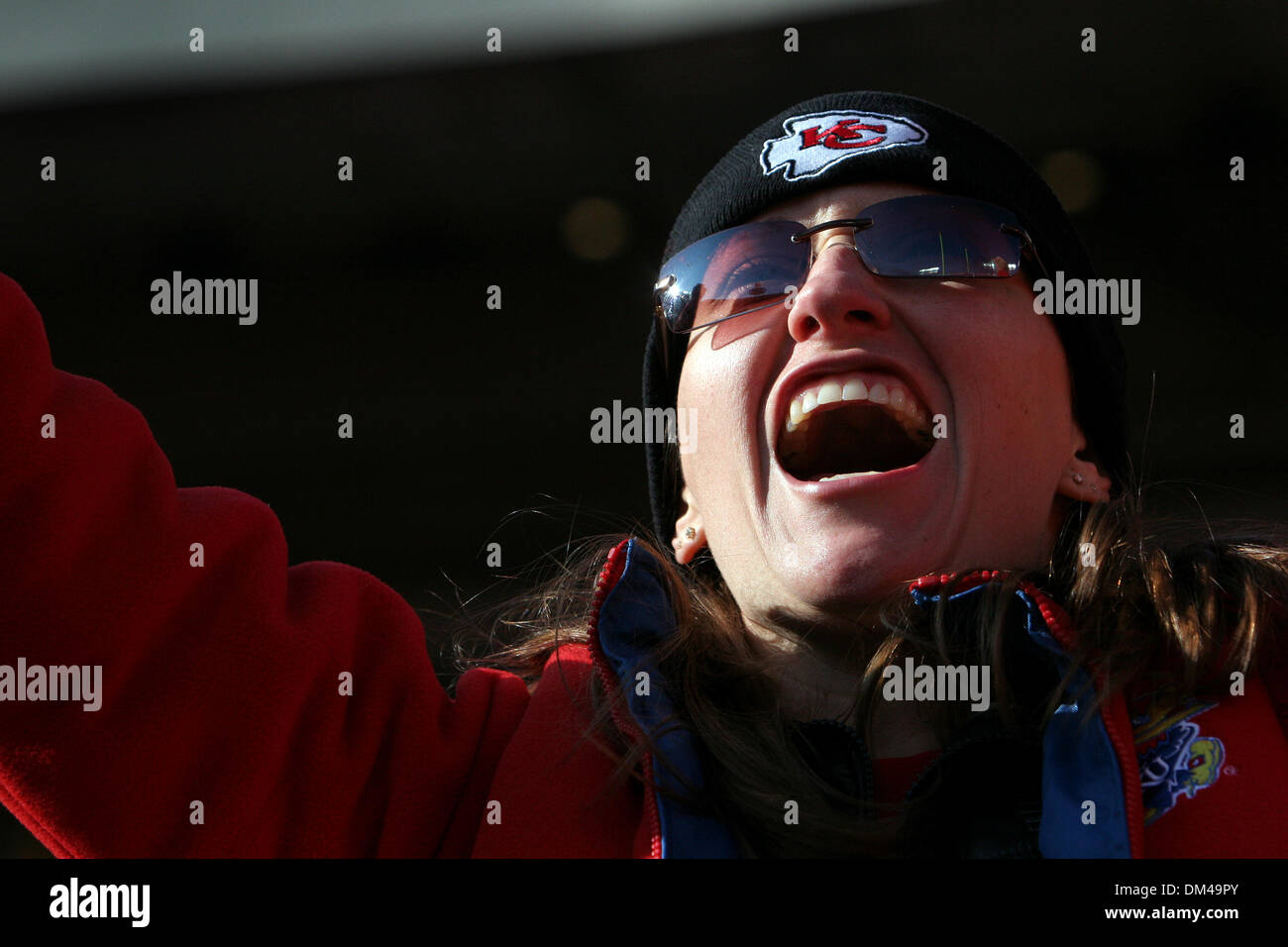 A Kansas City Chiefs fan cheers during the NFL football game between ...