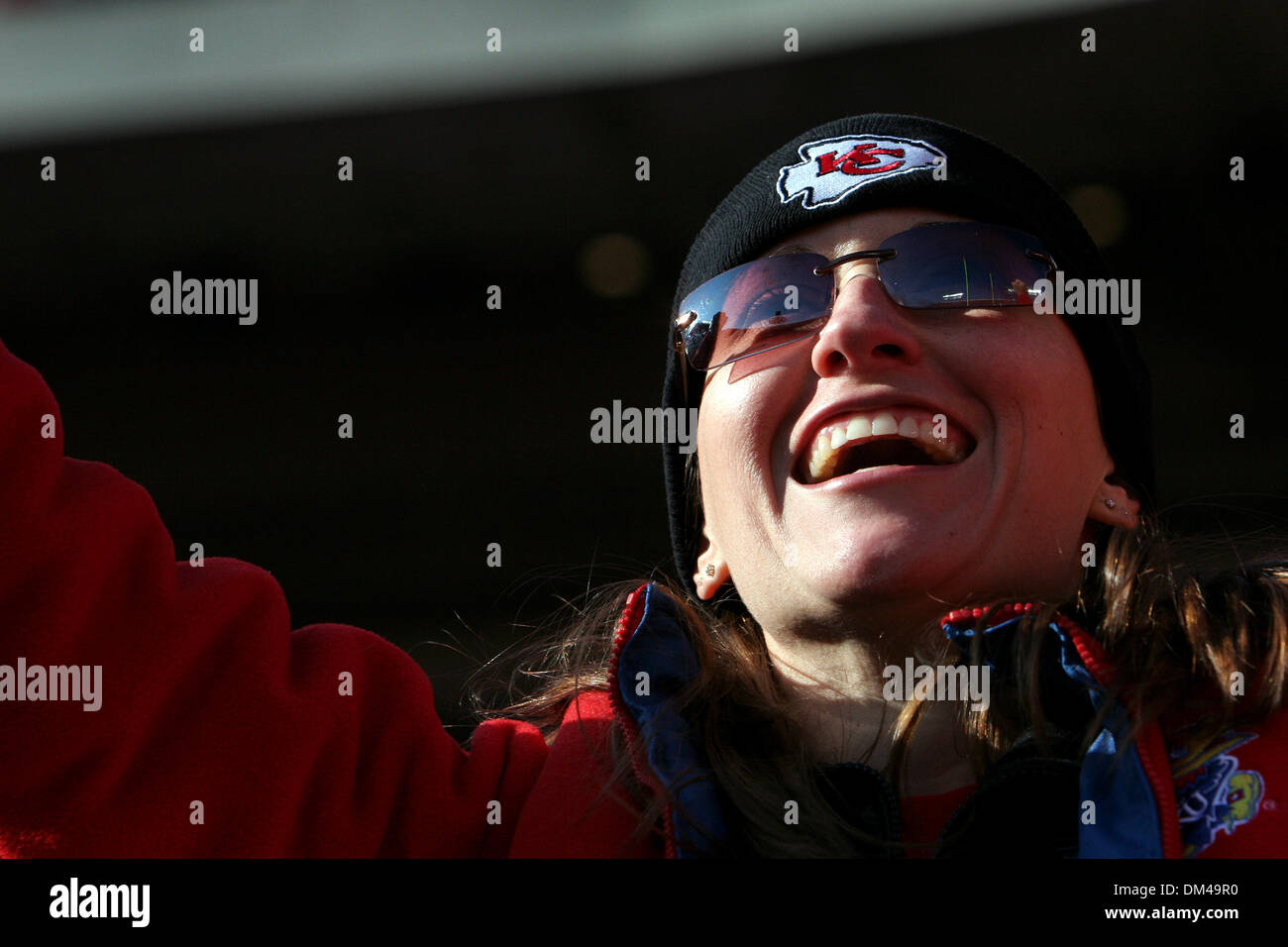 A Kansas City Chiefs fan cheers during the NFL football game between ...