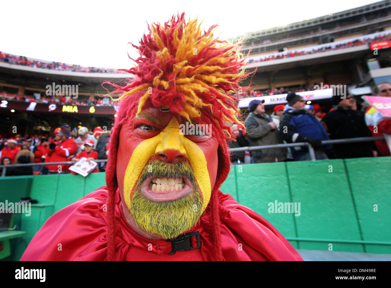 A Chiefs fan cheers after a touchdown during the NFL football game ...