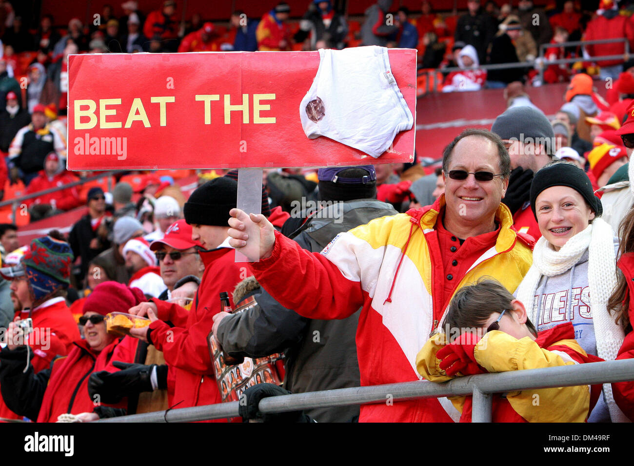 A Chiefs fan cheers with his sign during the NFL football game between ...