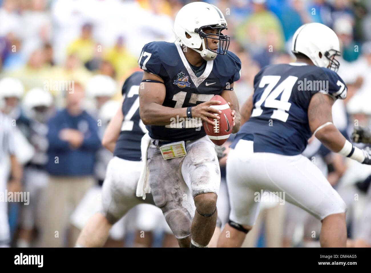 Penn State Nittany Lions quarterback Daryll Clark (17) scrambles in The ...