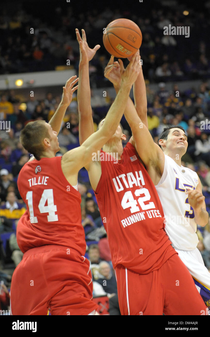 Utah center, #42 Jason Washburn, battles LSU forward, #3 Garrett Green ...