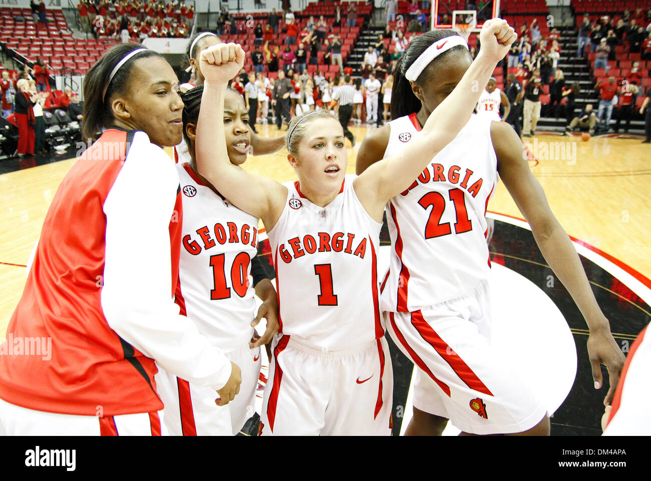 Georgia guard Ashley Houts (1) and teammates celebrate a win at the ...