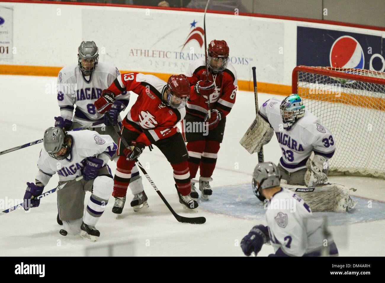 NCAA Non-Conference Game - NU's Derek Foam (14) blocked a shot as NU's ...