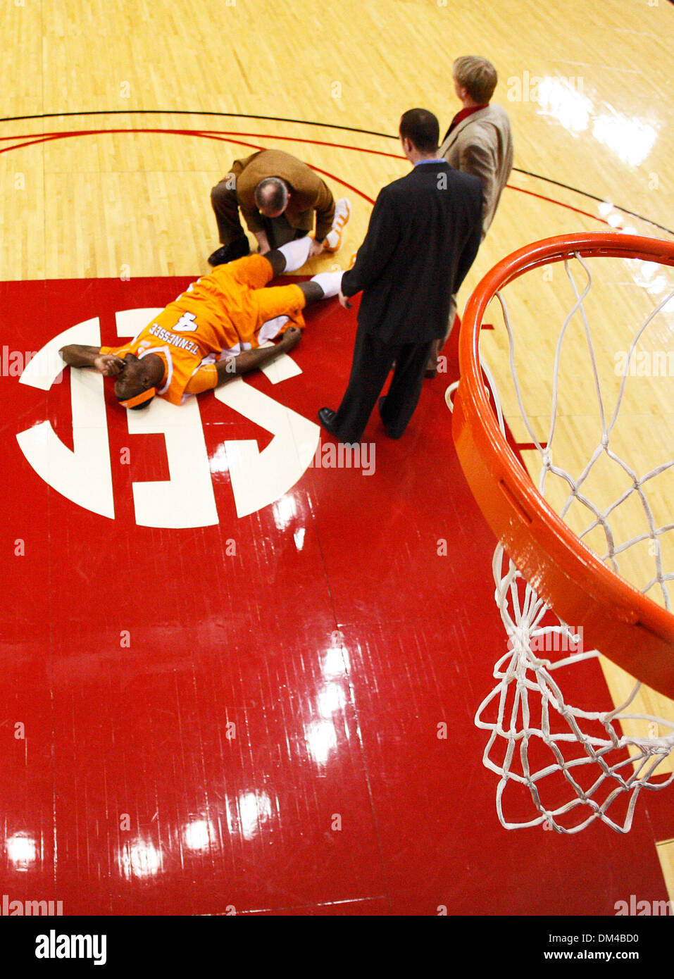 Tennessee forward/center Wayne Chism (4) lays on the ground after an ...