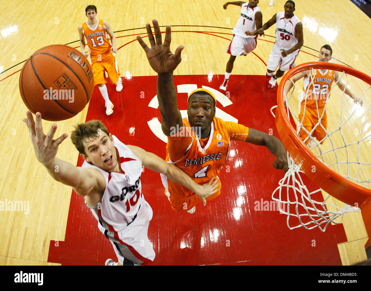 Georgia guard Ricky McPhee (10) goes for a layup on Tennessee forward ...